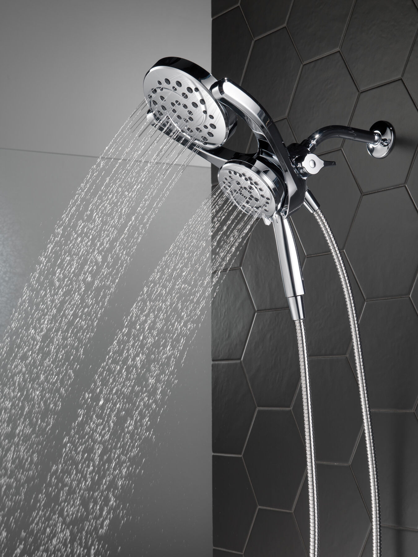 HydroRain® 4-Setting Two-in-One Shower Head in Chrome 75699 | Delta Faucet