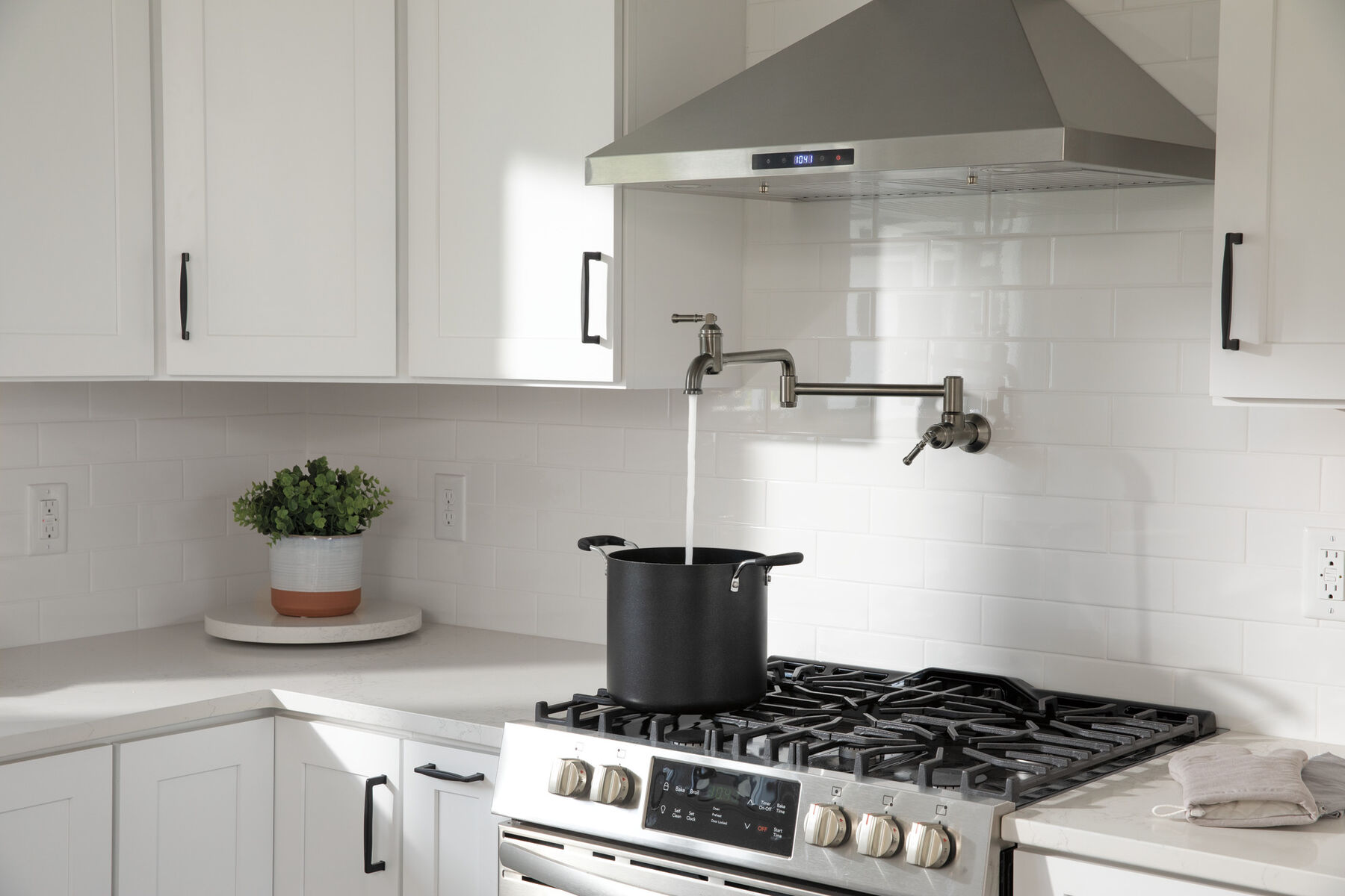 Wall Mount Pot Filler in Black Stainless 1190LFL-KS | Delta Faucet