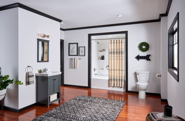 Elongated Toilet in White C43913-WH | Delta Faucet