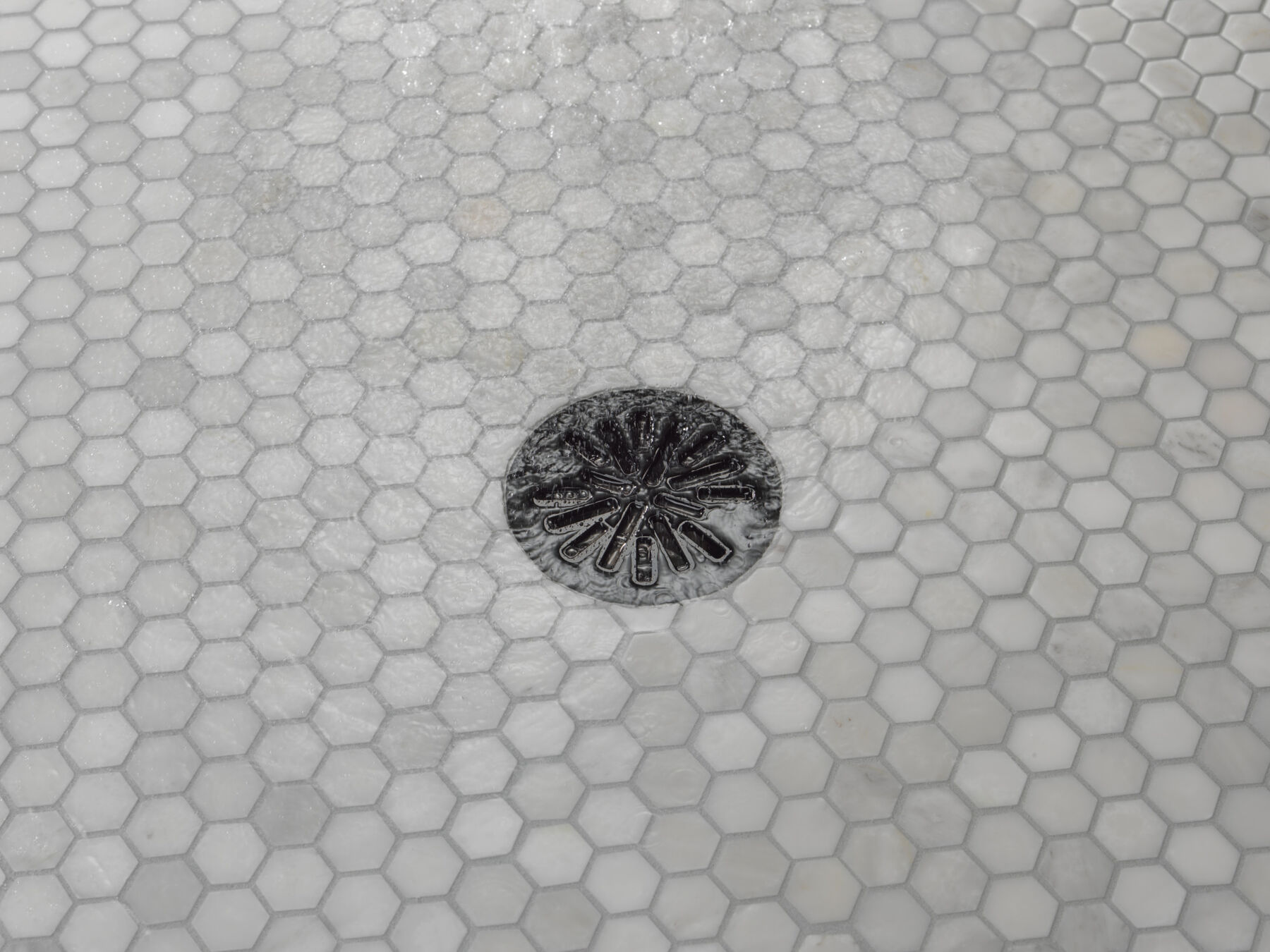 4" Tile-In Round Shower Drain in Matte Black DT061411-BL | Delta Faucet